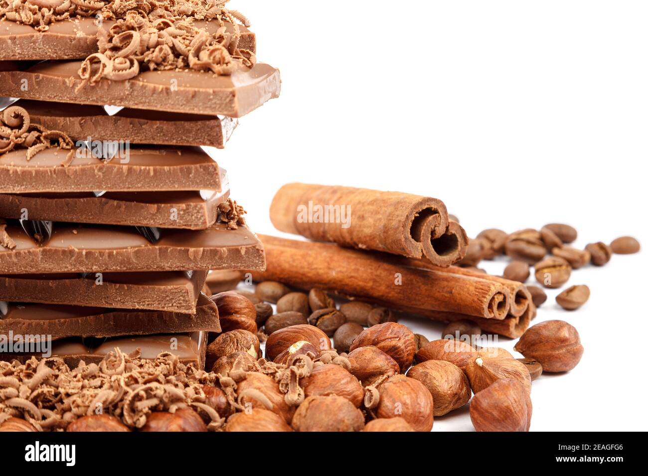Chocolate tiles and nuts isolated on white background Stock Photo - Alamy
