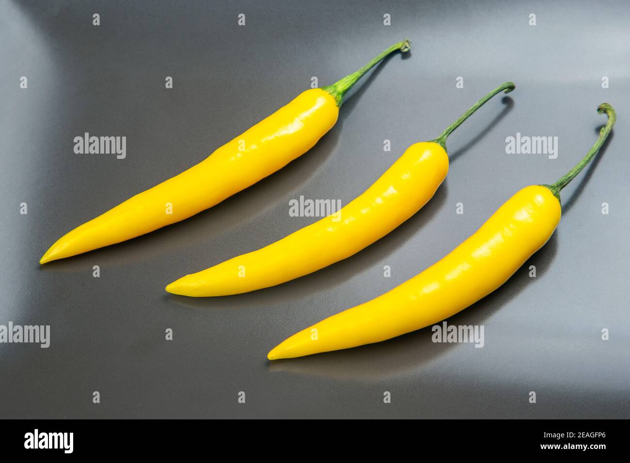 yellow hot chili on a plate. Pepper. Vegetable vitamin food Stock Photo ...