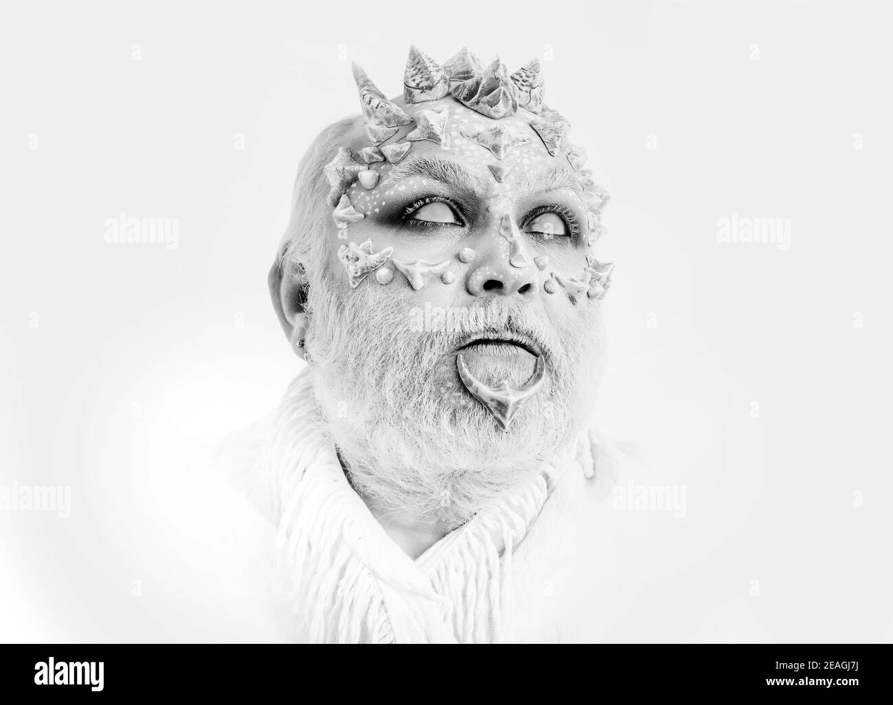 Devil man with blind eyes looking up. Wizard with dragon skin. Monster ...