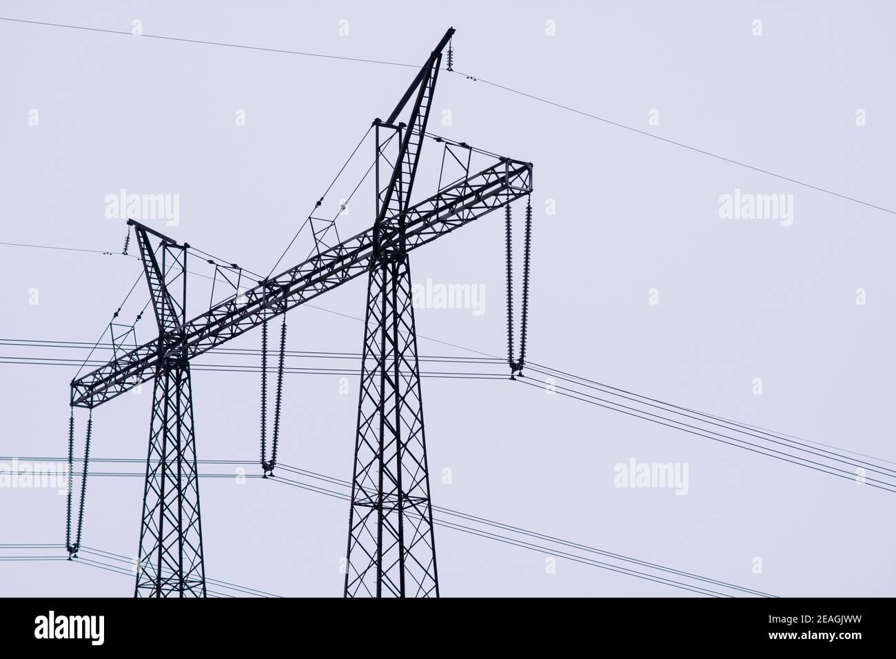 High-voltage power transmission towers Stock Photo - Alamy