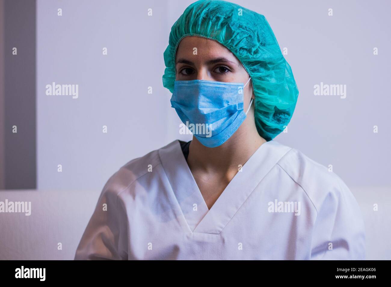Portrait of a female doctor with a face mask Stock Photo - Alamy