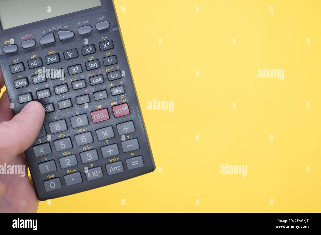 Calculations on scientific calculator hi-res stock photography and ...