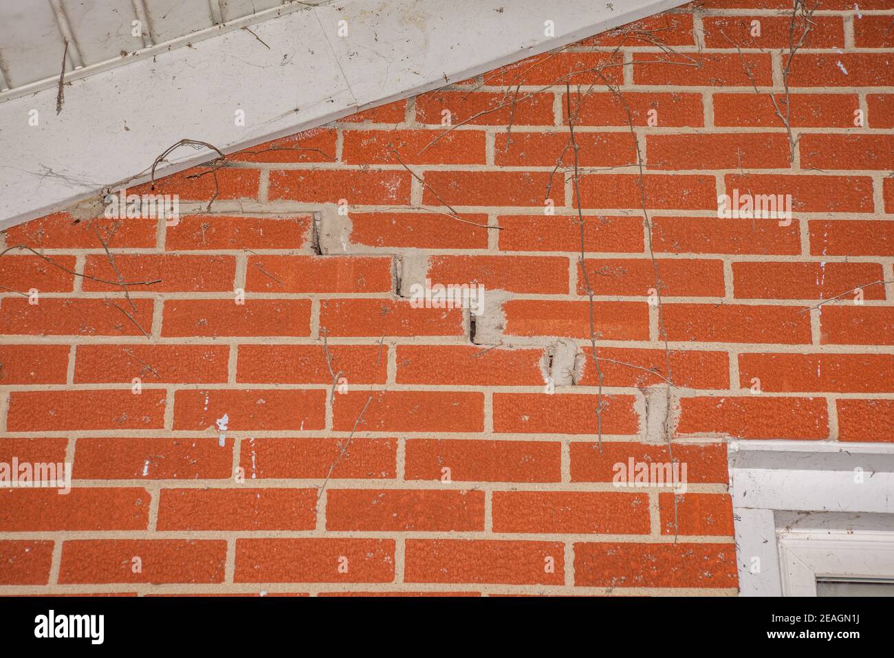 Severe cracked walls on a brick house due to foundation failure Stock ...