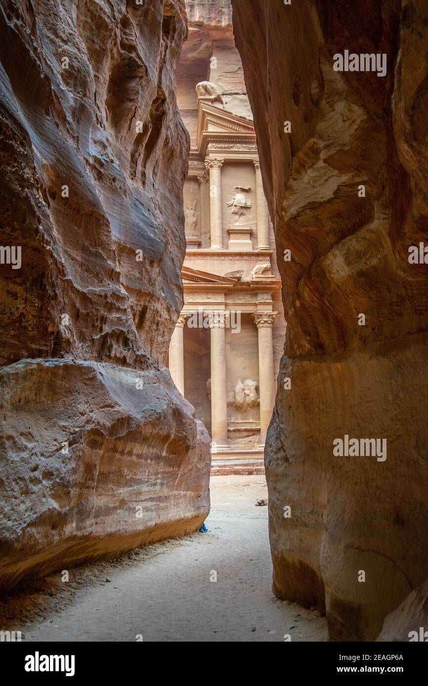 Al Khazneh tomb view through narrow siq canyon at Petra, Jordan Stock ...