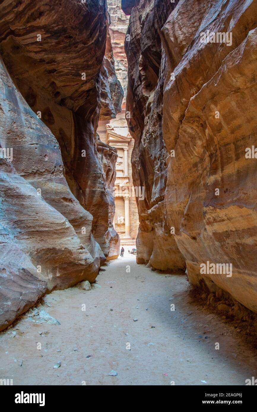 Al Khazneh tomb view through narrow siq canyon at Petra, Jordan Stock ...