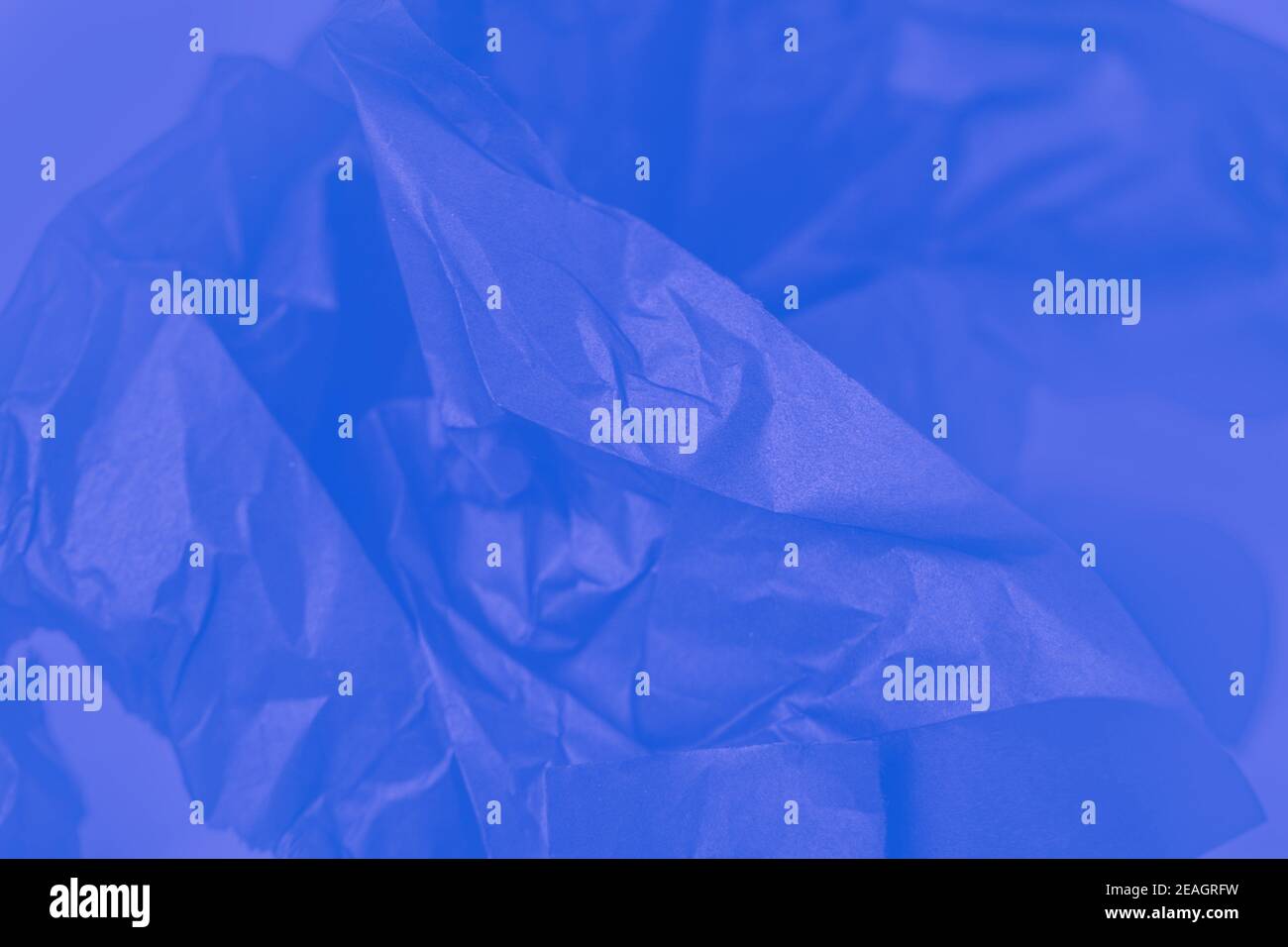 Crumpled blue lustrous paper abstract texture background Stock Photo ...