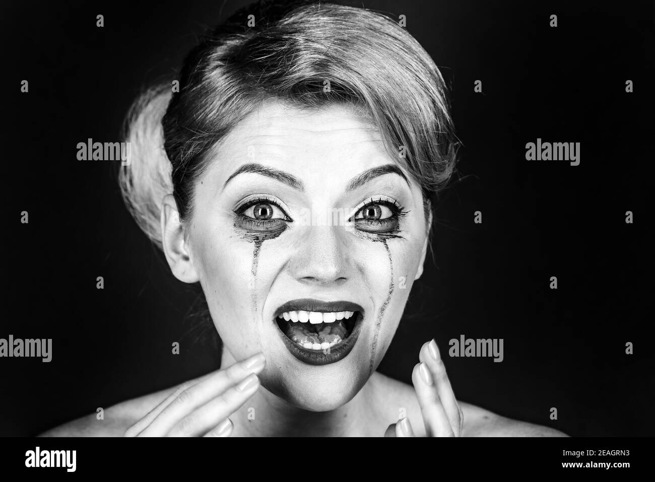 Woman drama and shock concept. Girl cry with mascara streams on face ...