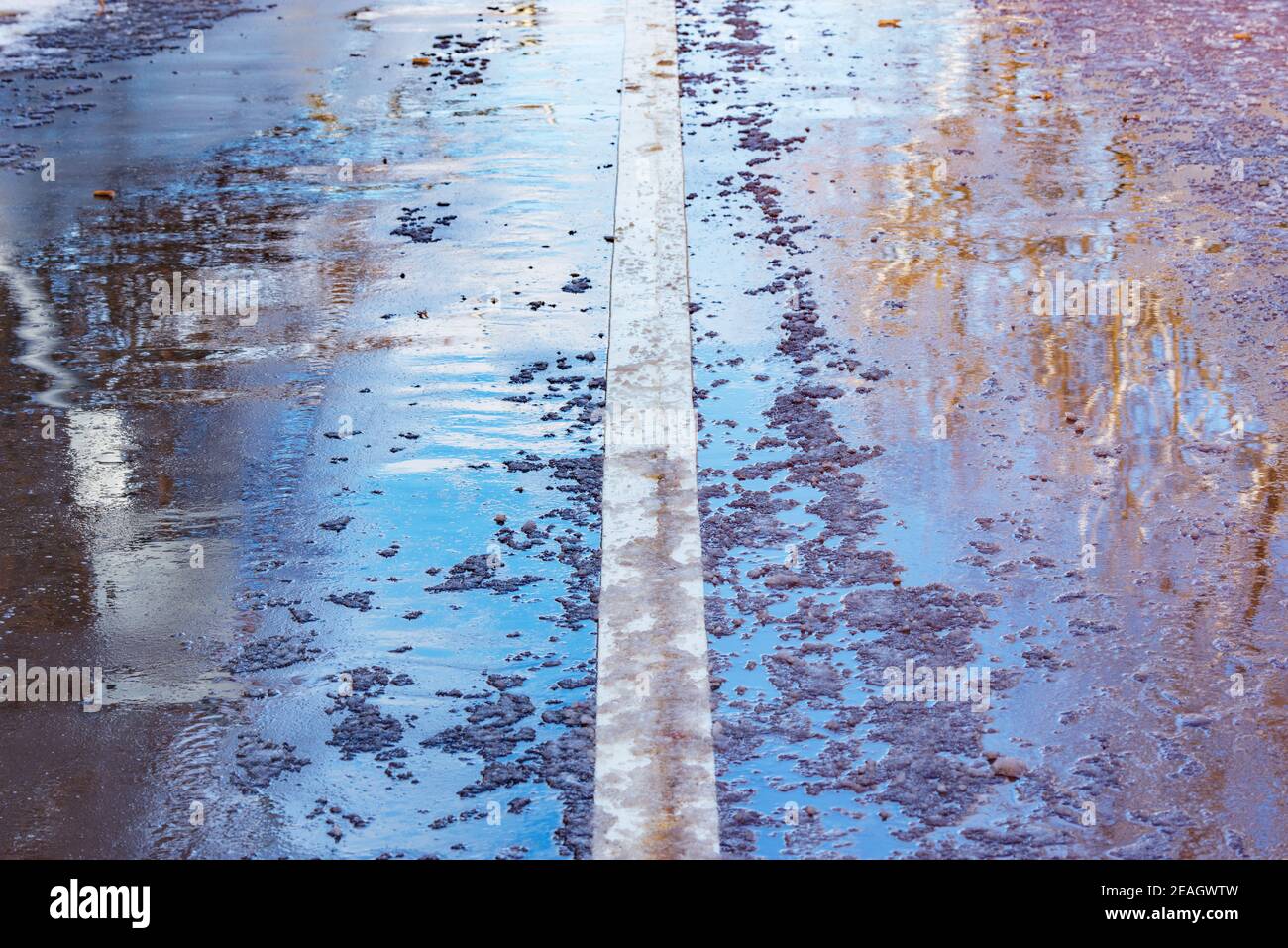 Wet asphalt road surface at winter morning Stock Photo - Alamy