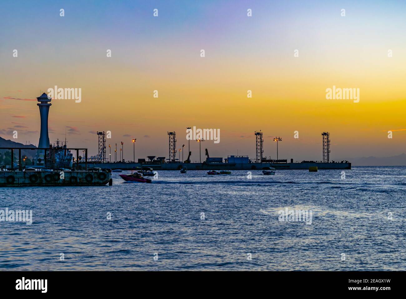 Sunset view of a port at Aqaba, Jordan Stock Photo - Alamy