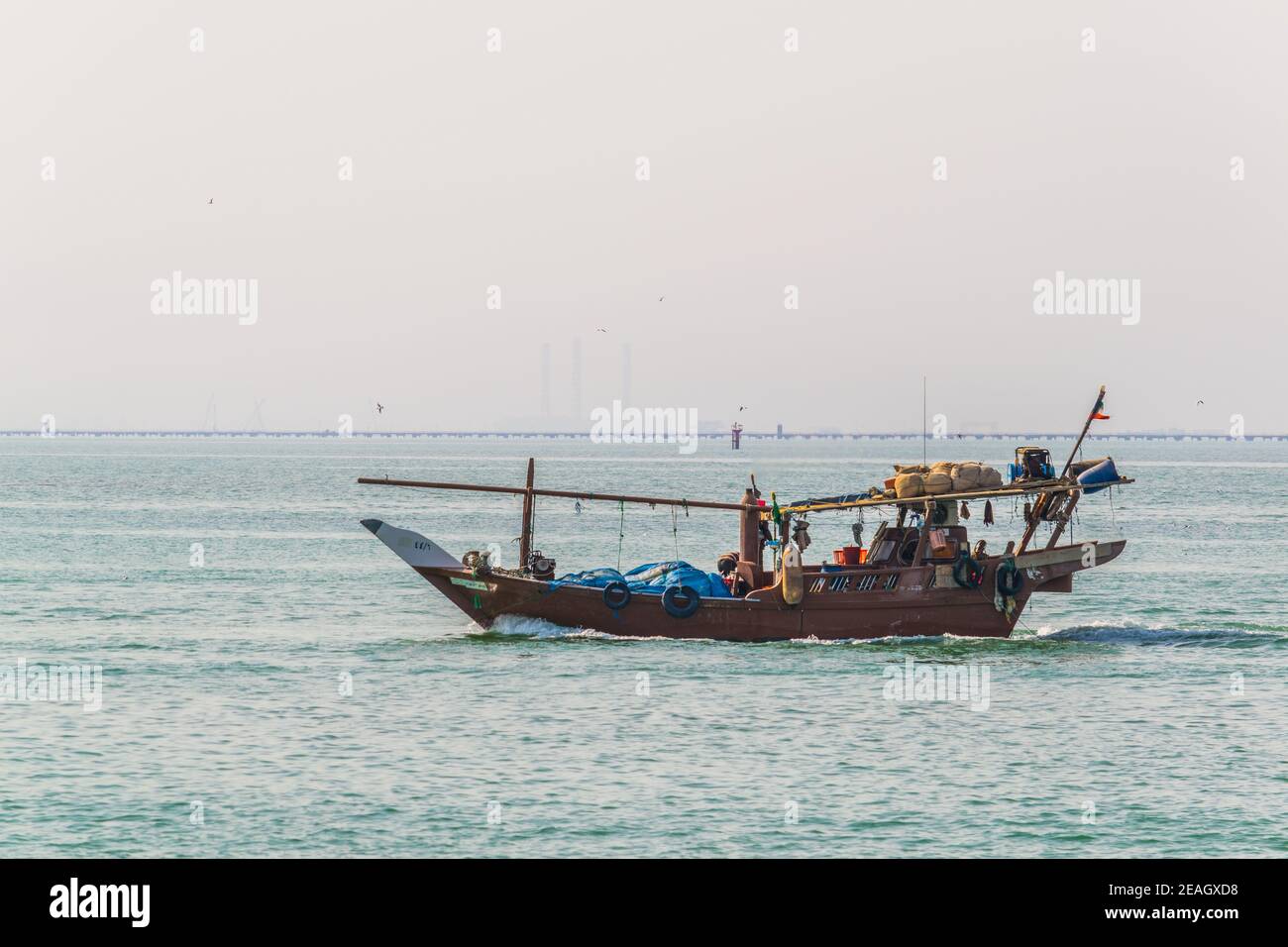View of a dhow ship on an open sea in Kuwait Stock Photo - Alamy
