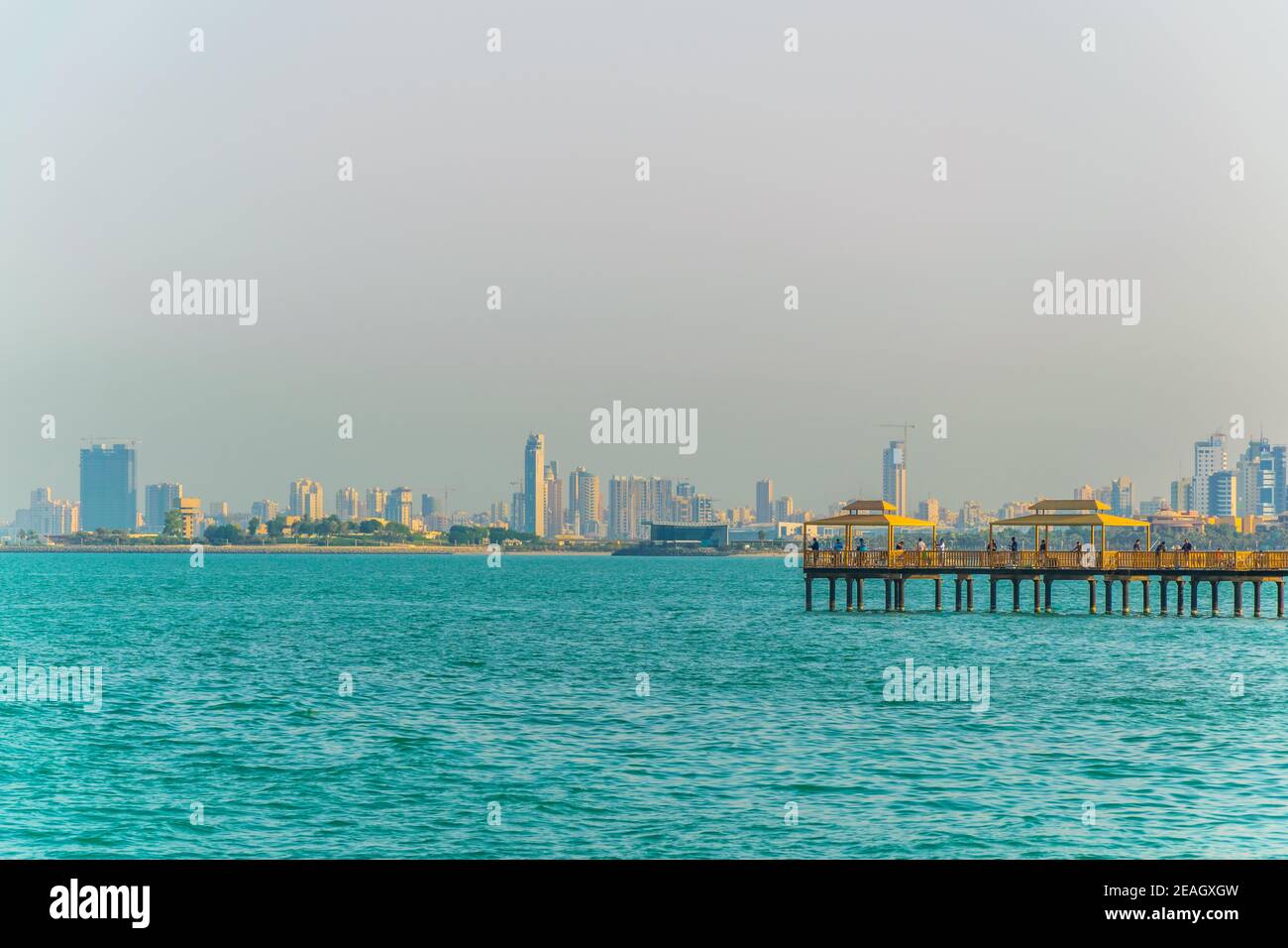 Skyline of Kuwait during sunset Stock Photo - Alamy