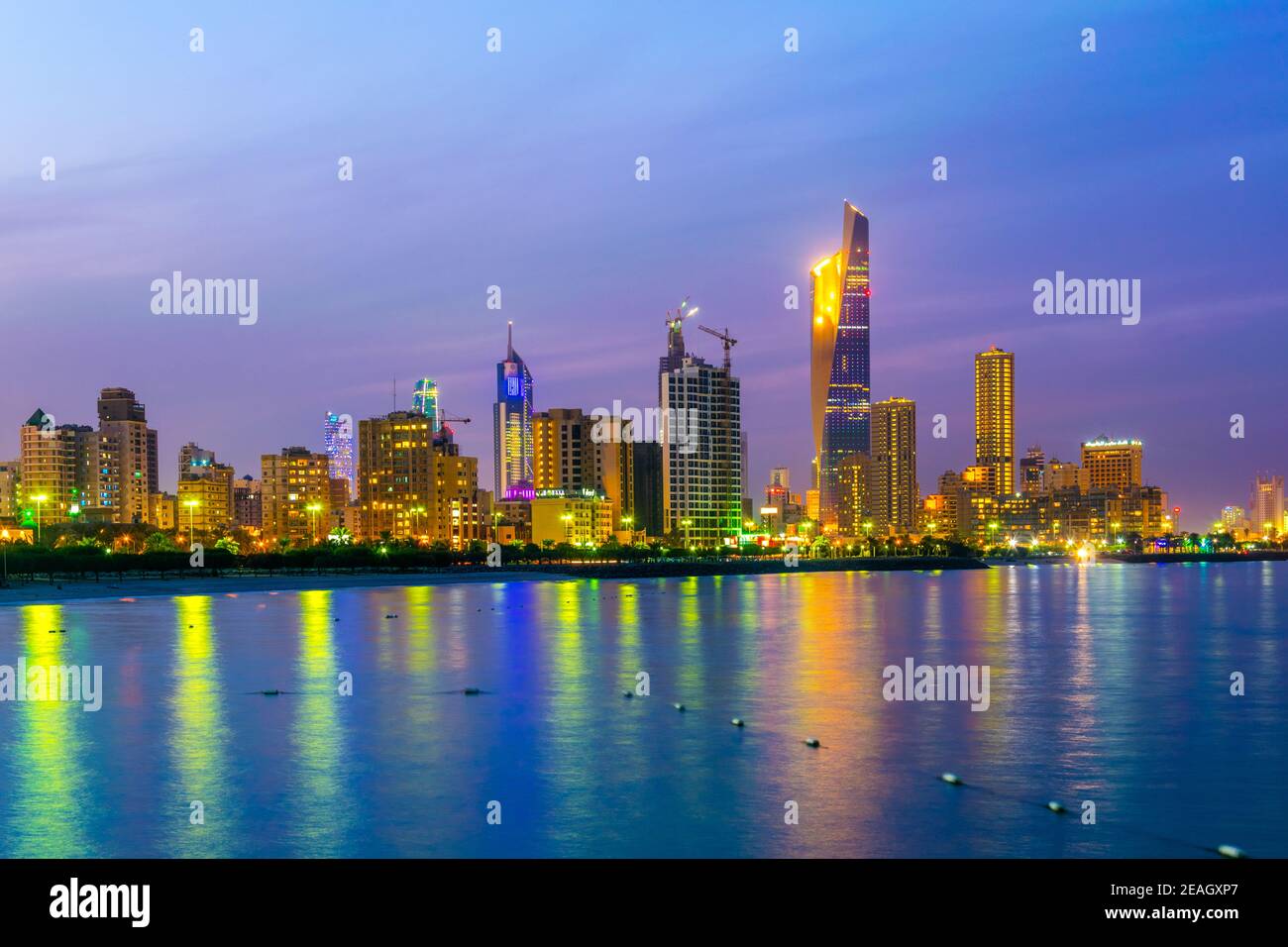Skyline of Kuwait during night Stock Photo - Alamy