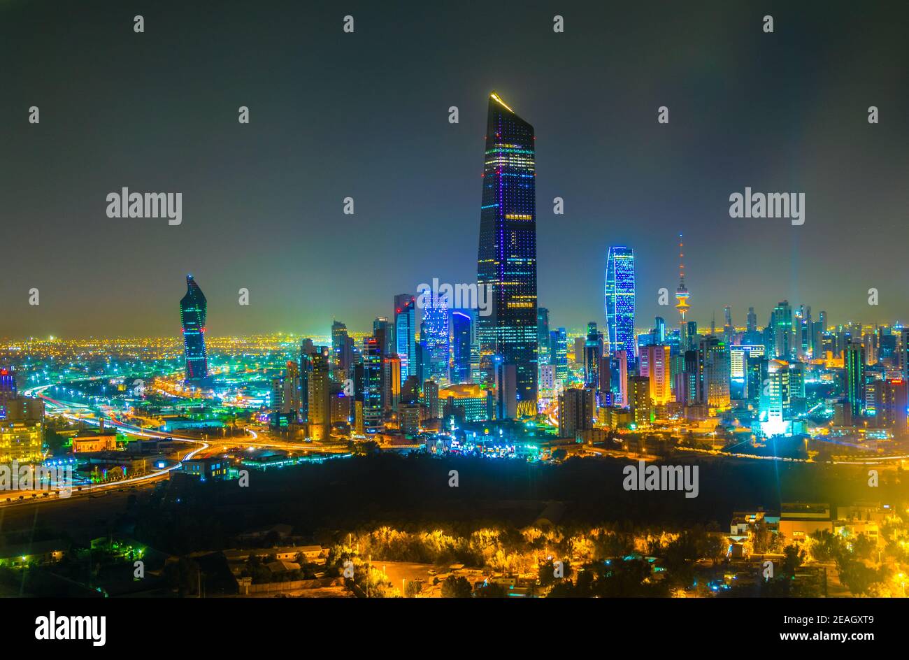 Night aerial view of the downtown Kuwait dominated by the liberation ...