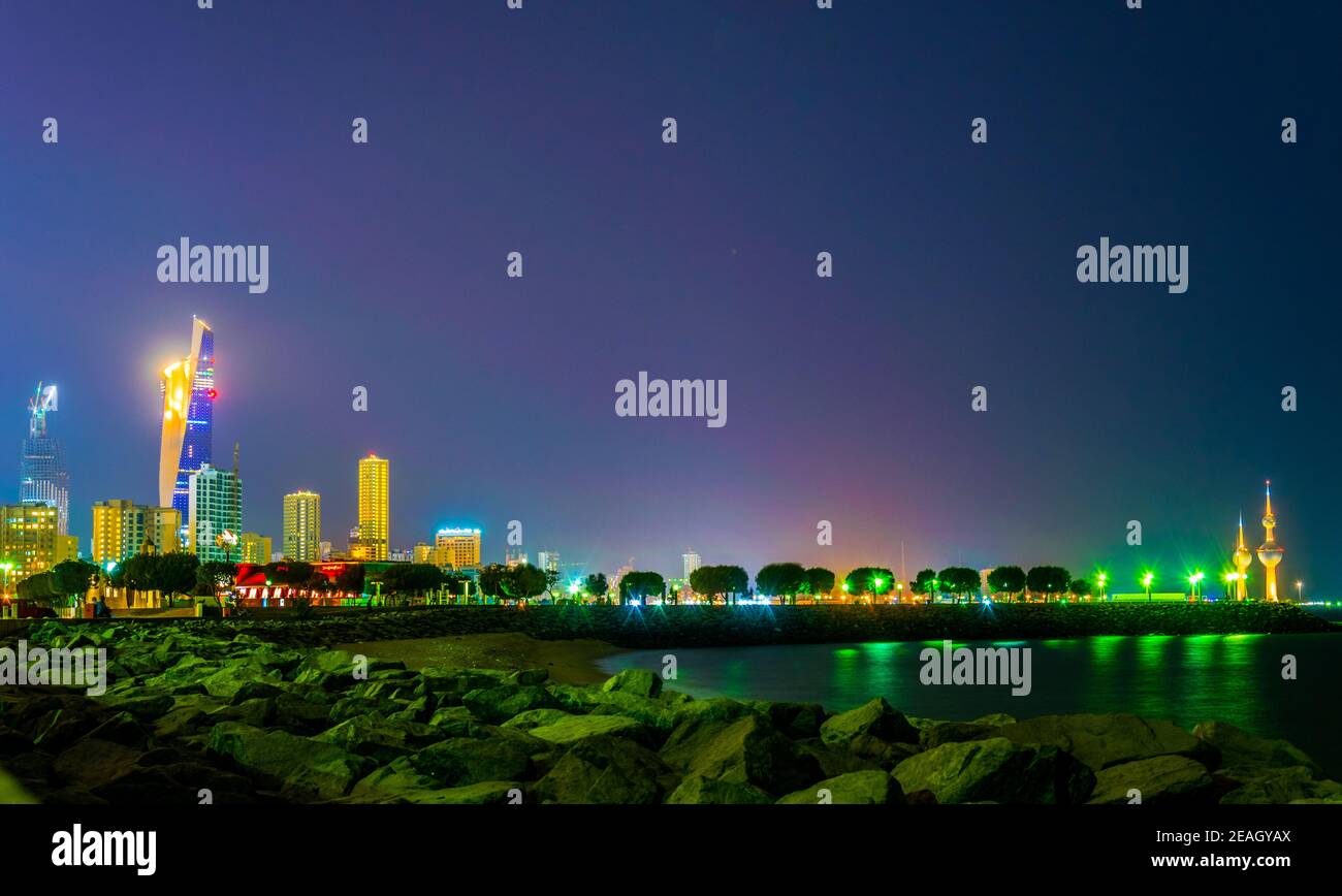 Skyline of Kuwait during night Stock Photo - Alamy
