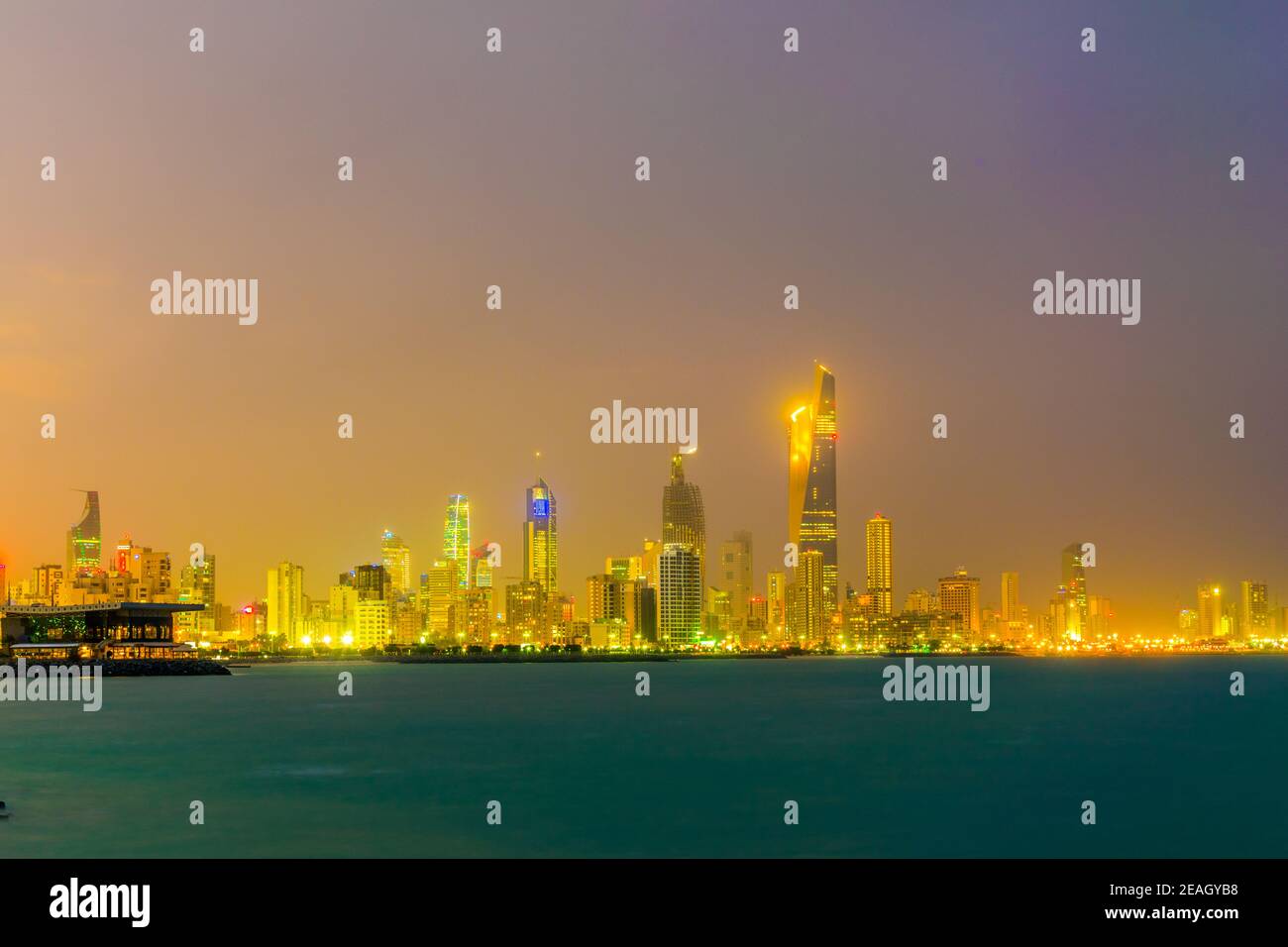 Skyline of Kuwait during night Stock Photo - Alamy