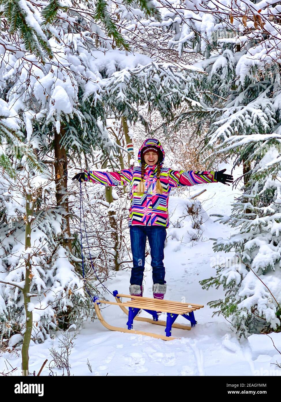 Girl with sled hi-res stock photography and images - Alamy