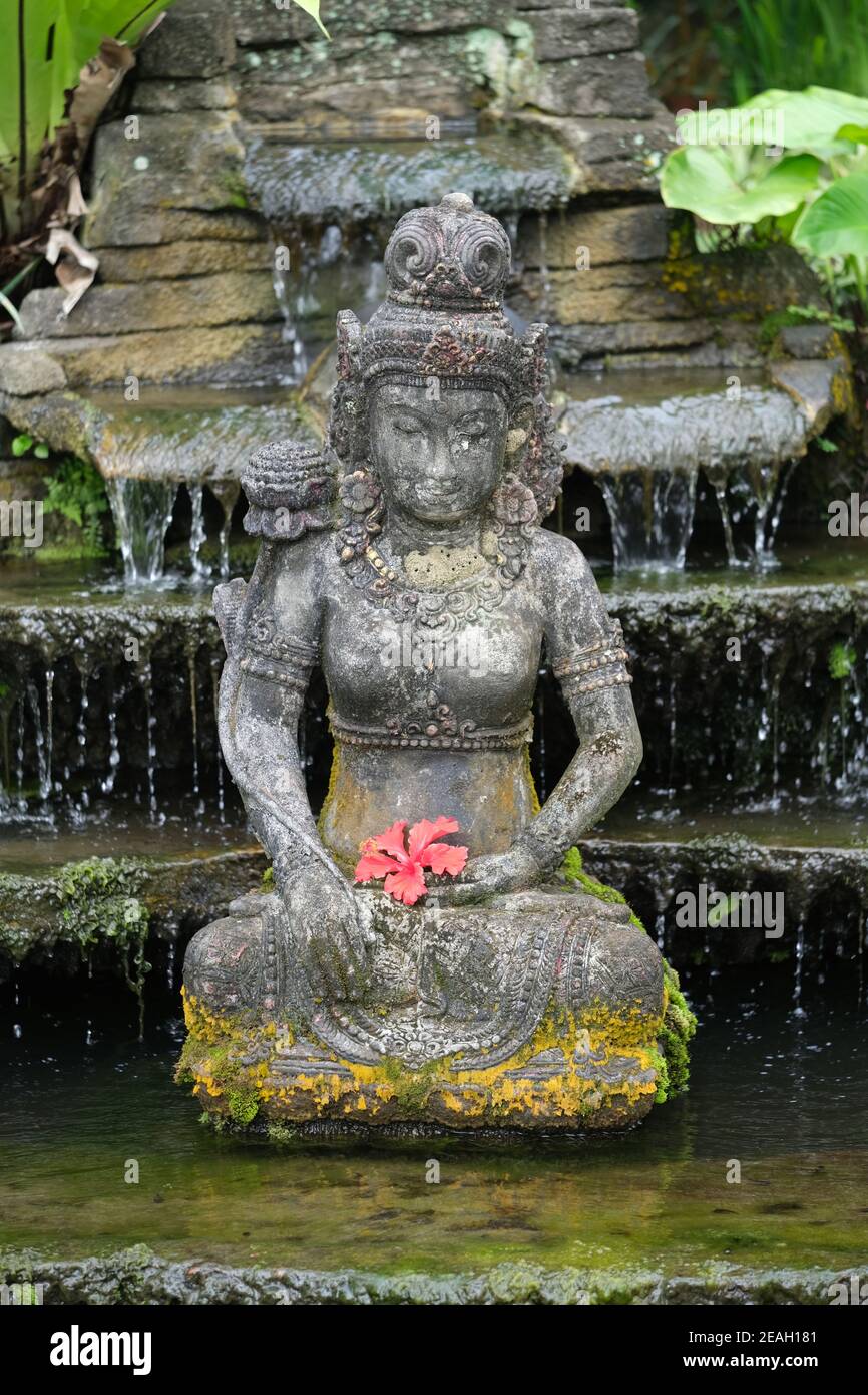 Indonesia Bali - Ubud Handmade Balinese stone statue with Hibiscus ...
