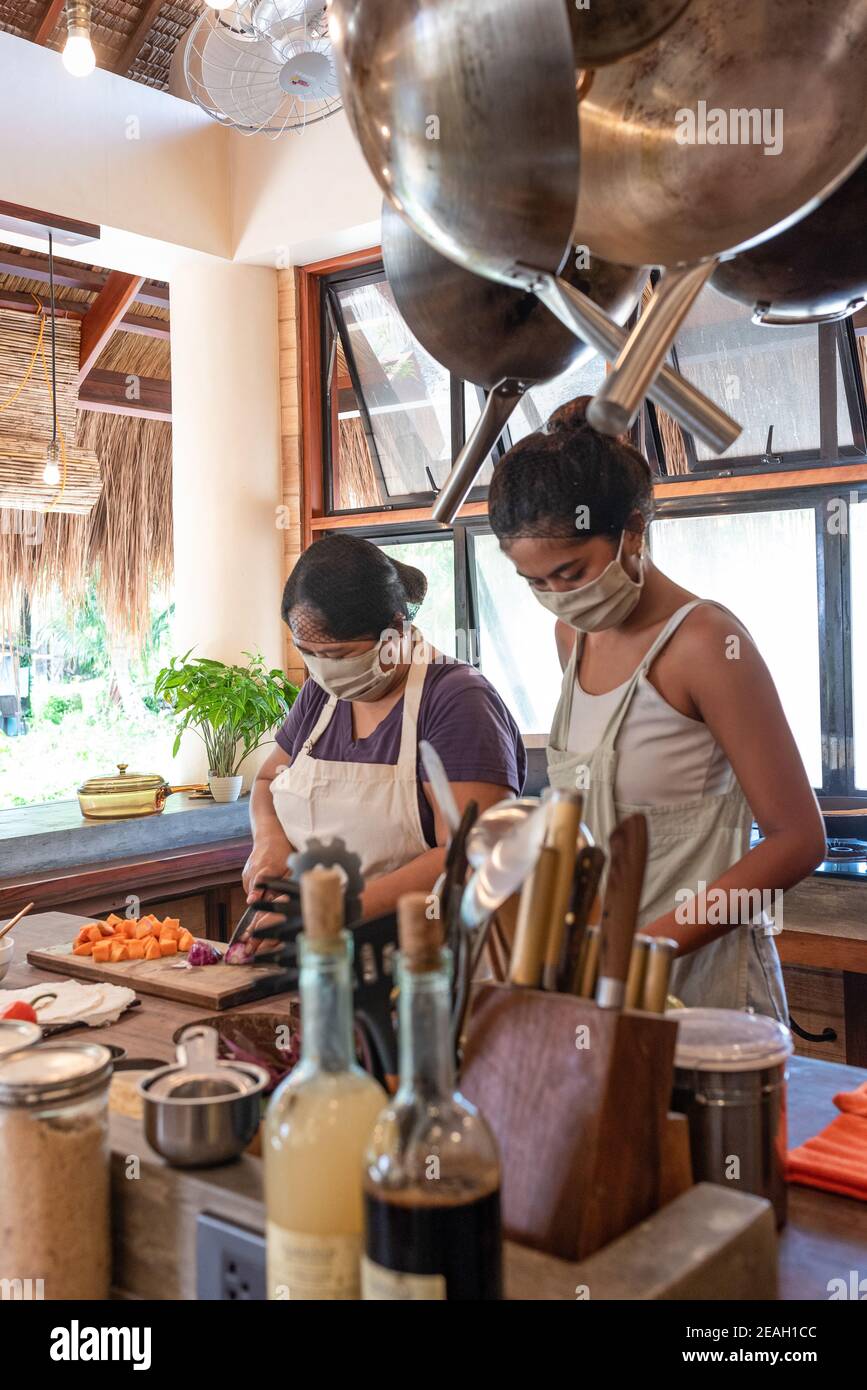 Face Mask Two Asian Female Cooks on Duty Chopping Vegetables Bright ...
