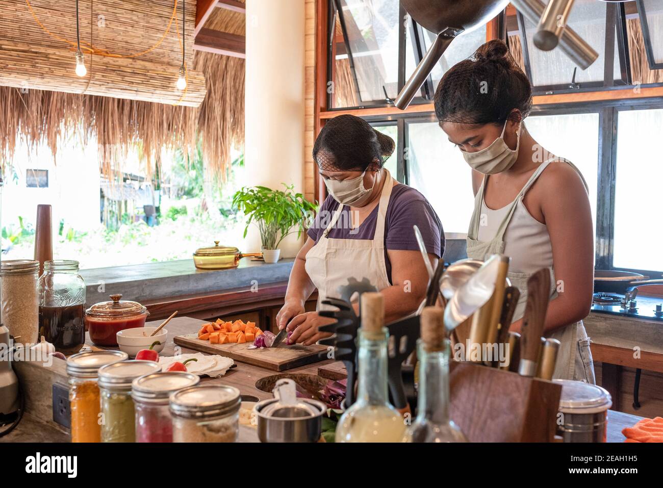 Face Mask Two Asian Female Cooks on Duty Chopping Vegetables Bright ...