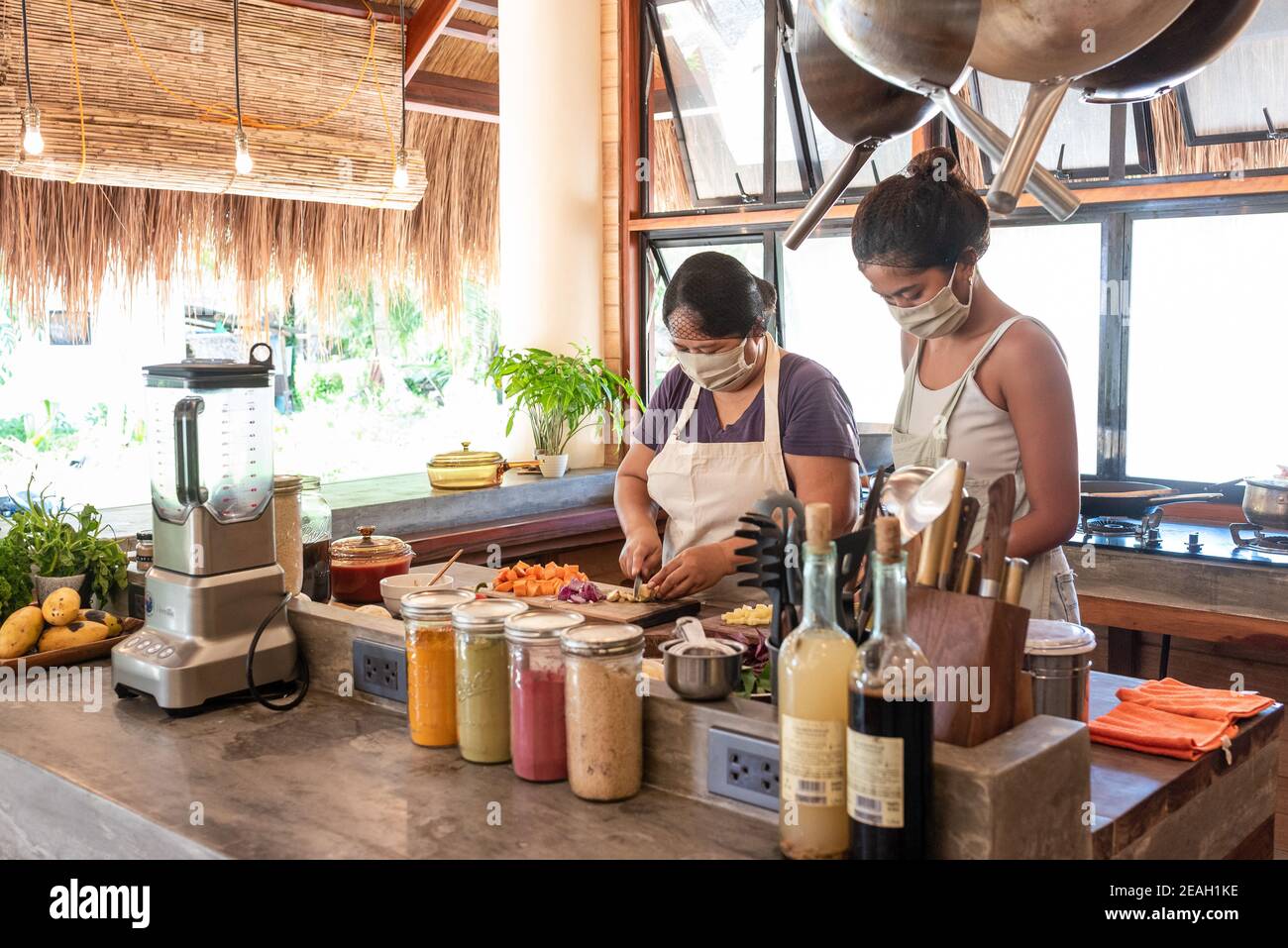Face Mask Two Asian Female Cooks on Duty Chopping Vegetables Bright ...