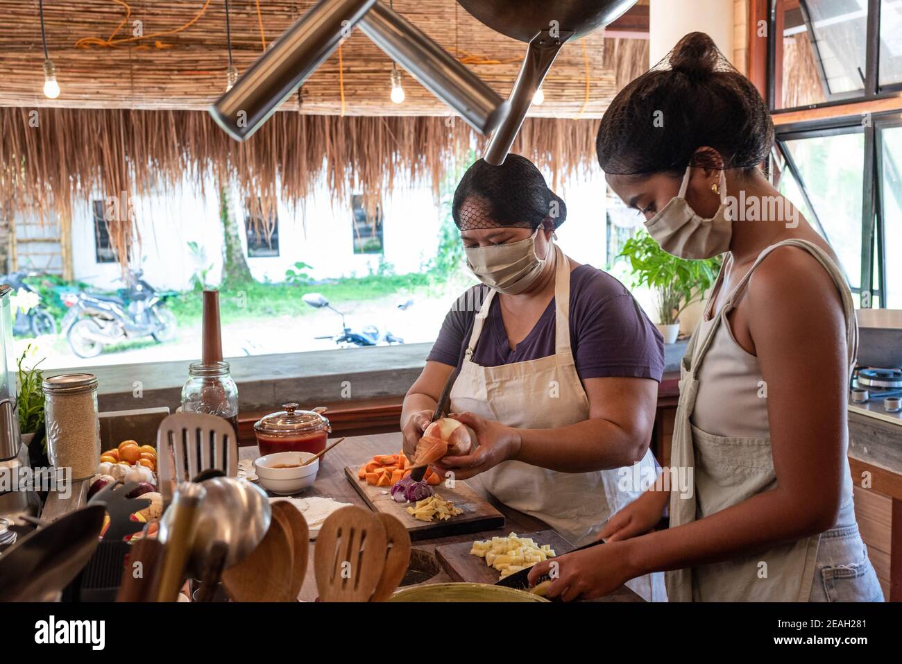 Face Mask Two Asian Female Cooks on Duty Chopping Vegetables Bright ...