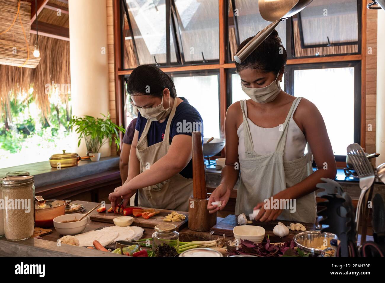 Face Mask Two Asian Female Cooks on Duty Chopping Vegetables Bright ...