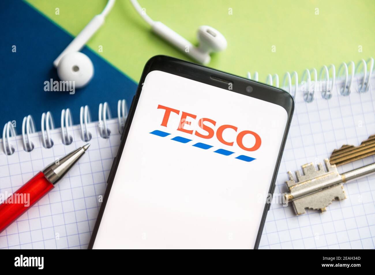 In this photo illustration, a Tesco logo seen displayed on a smartphone ...