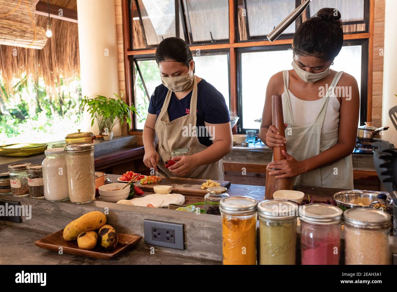 Face Mask Two Asian Female Cooks on Duty Chopping Vegetables Bright ...