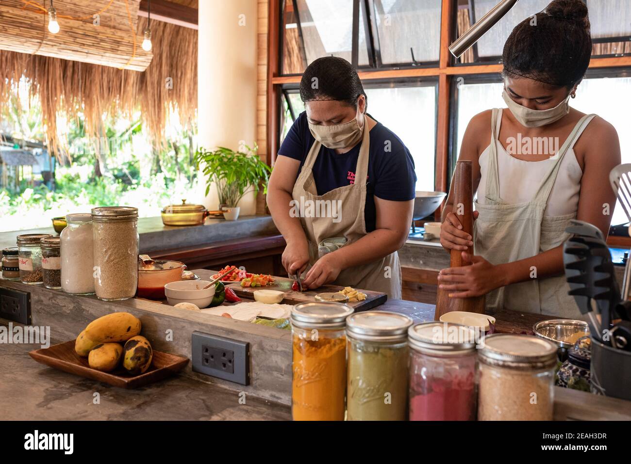 Face Mask Two Asian Female Cooks on Duty Chopping Vegetables Bright ...