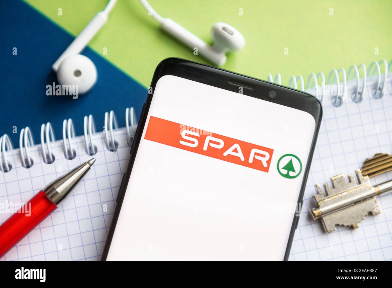 In this photo illustration, a Spar logo seen displayed on a smartphone ...