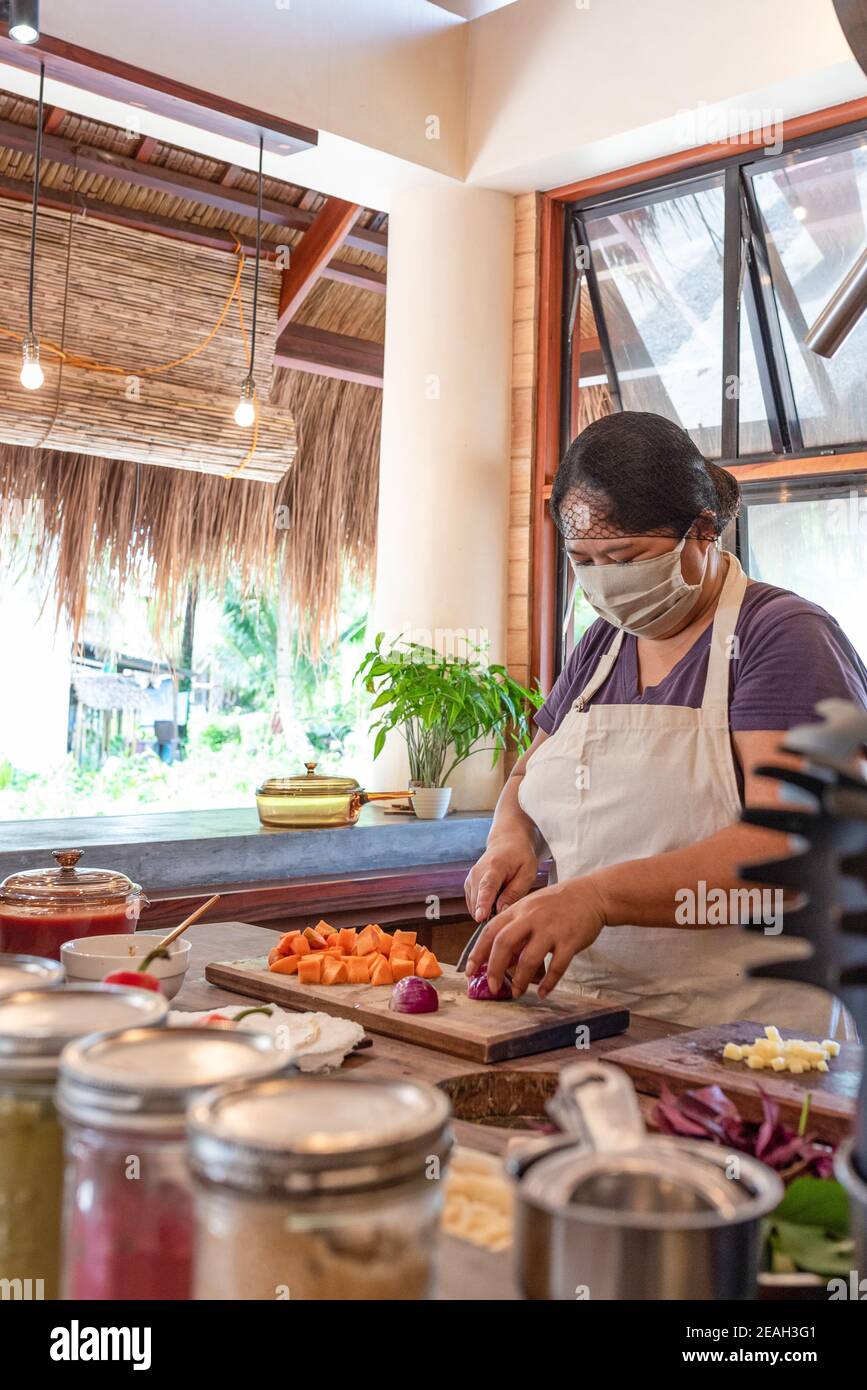 Face Mask Two Asian Female Cooks on Duty Chopping Vegetables Bright ...