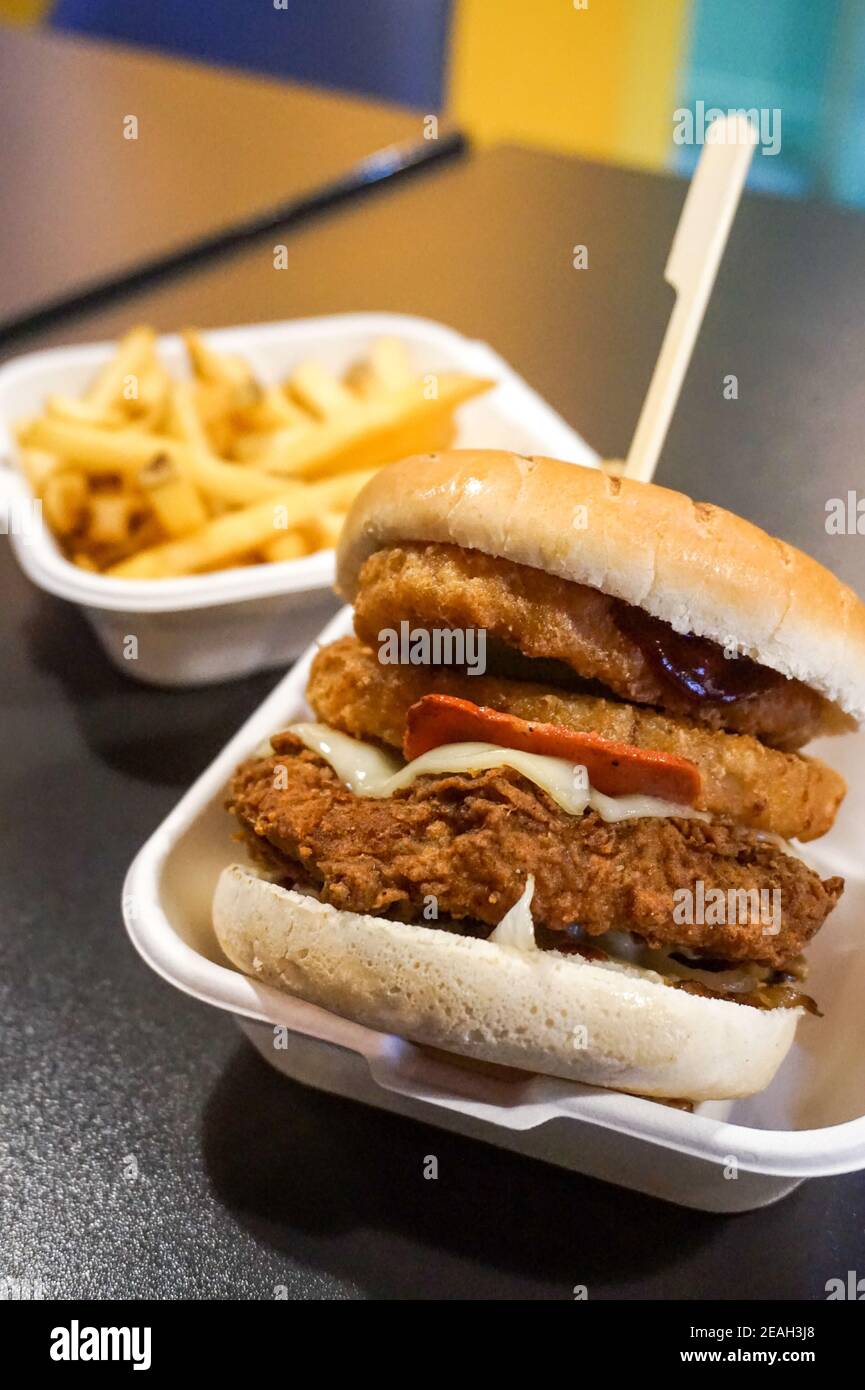 Stacked Plant-based burger & chips from V-Rev Vegan Diner restaurant in ...