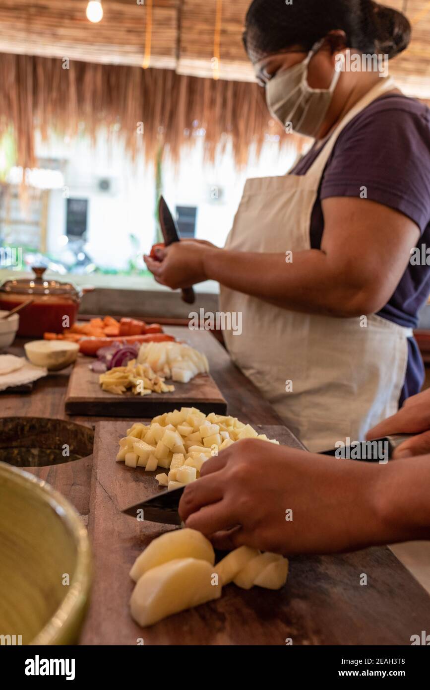 Face Mask Two Asian Female Cooks on Duty Chopping Vegetables Bright ...