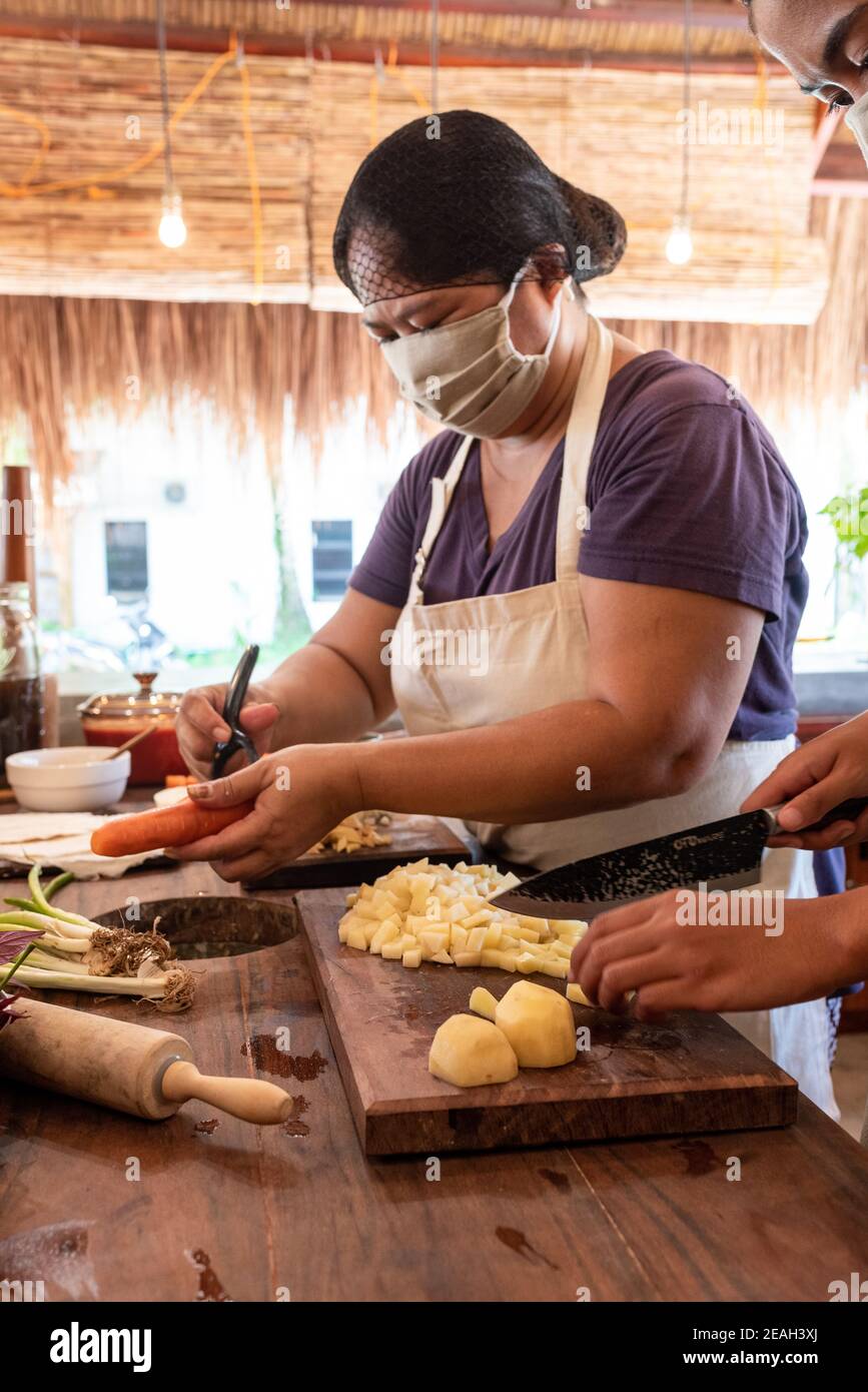 Face Mask Two Asian Female Cooks on Duty Chopping Vegetables Bright ...