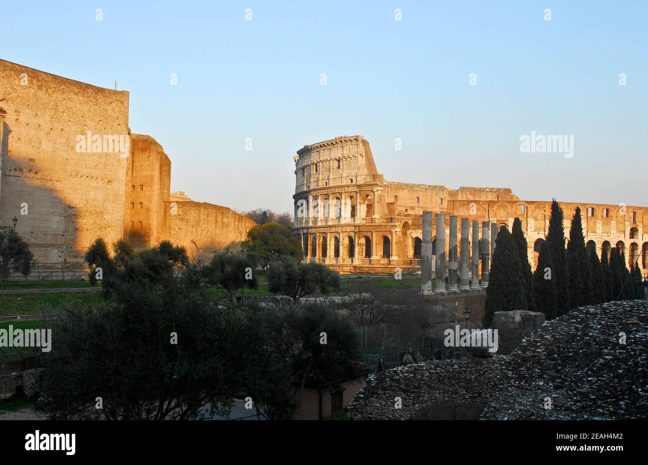 Roman Coliseum and Roman Forum: outside view at sunset Stock Photo - Alamy