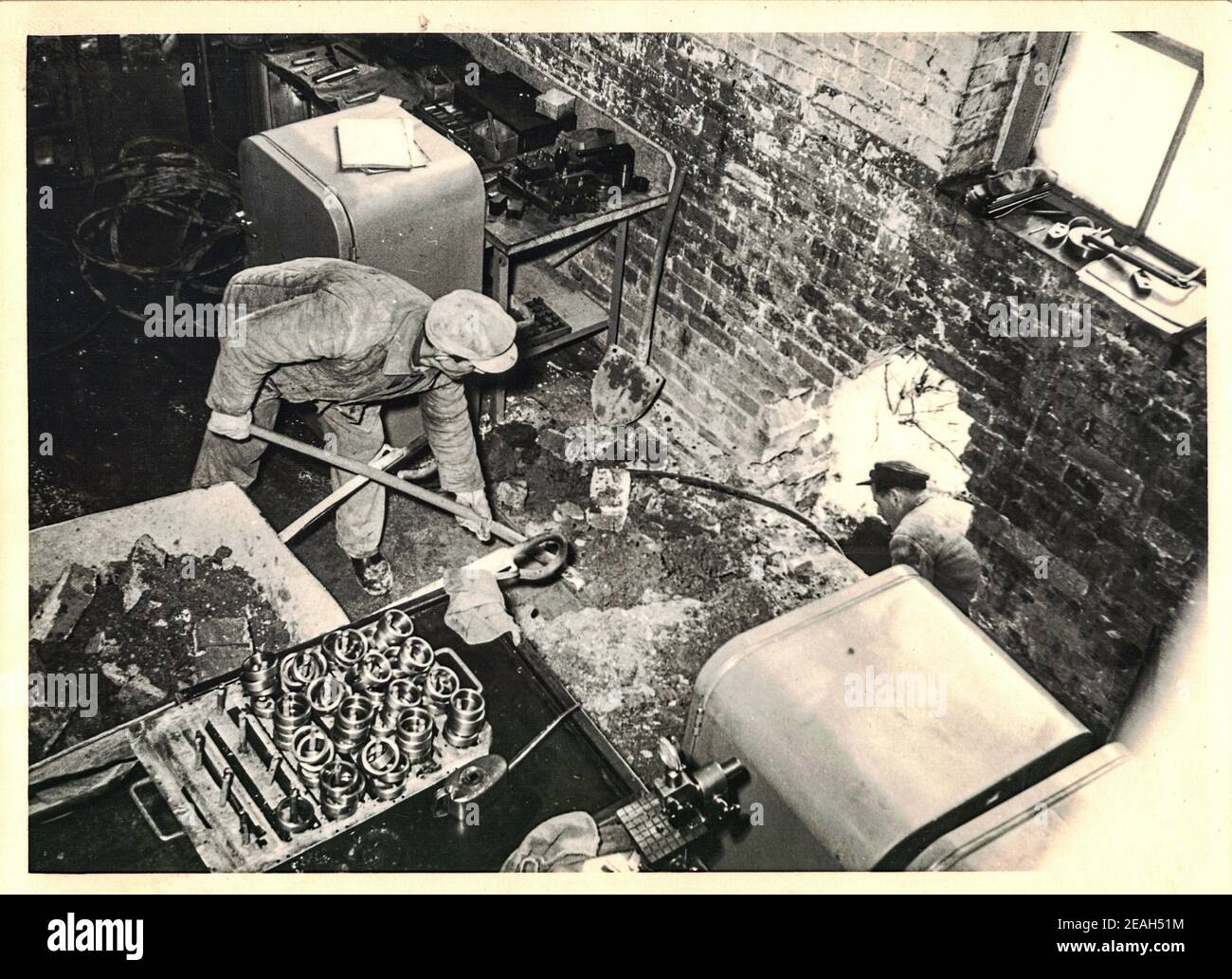 FRAUREUTH, EAST GERMANY - MARCH 3, 1965: Workers in factory. Retro ...