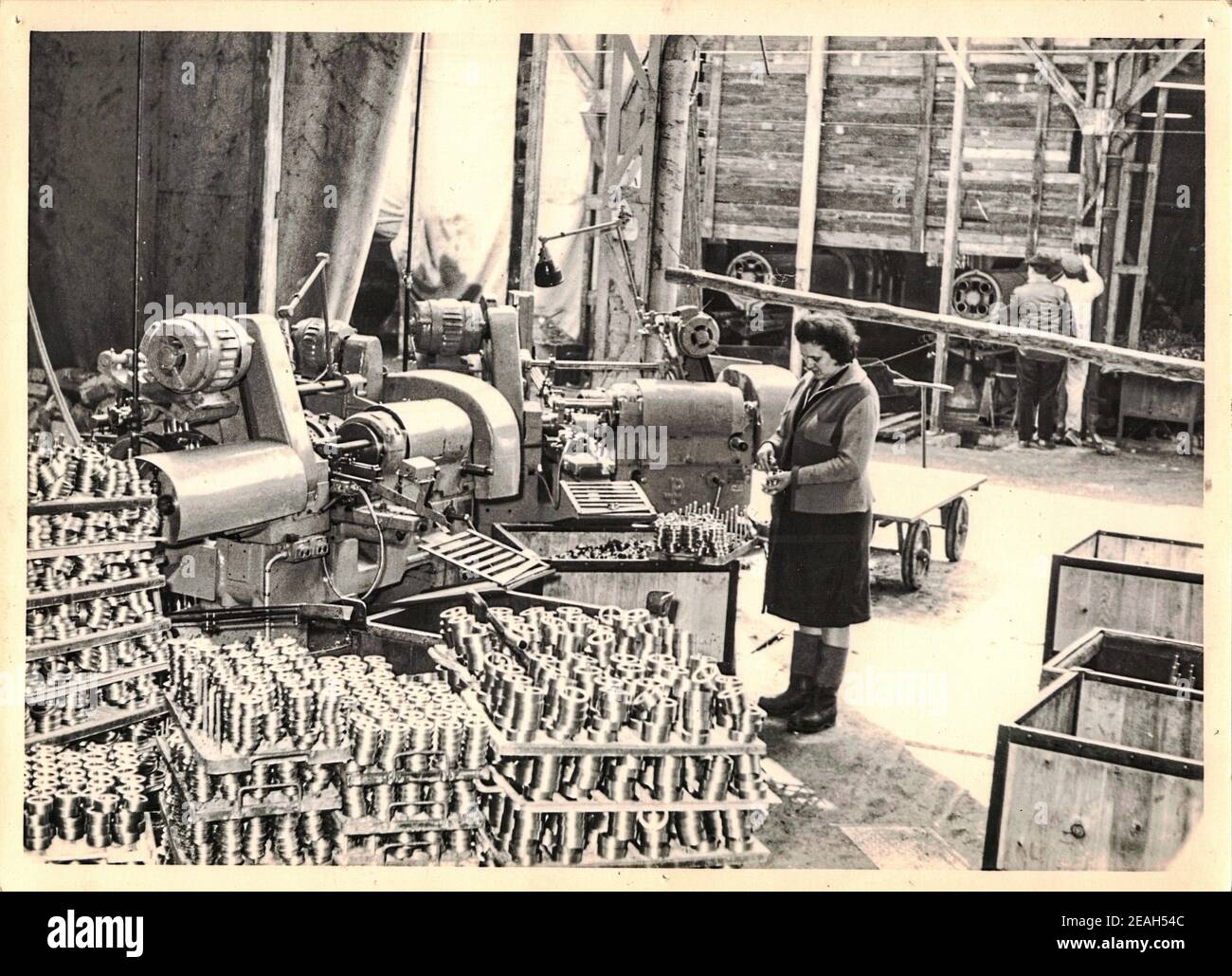 FRAUREUTH, EAST GERMANY - MAY 21, 1965: The retro photo shows workwoman ...