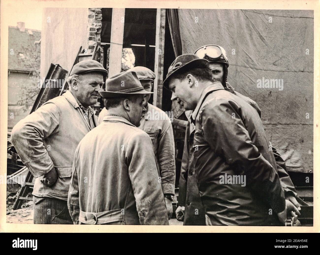 FRAUREUTH, EAST GERMANY - MAY 21, 1965: Retro photo shows workers at ...