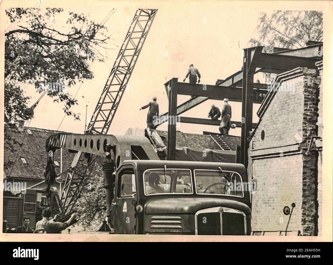 FRAUREUTH, EAST GERMANY - MAY 26, 1965: Retro photo shows workers at ...