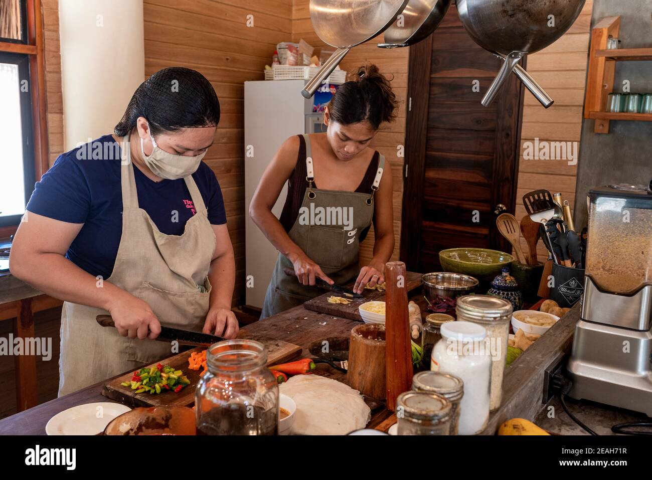 Face Mask Two Asian Female Cooks on Duty Chopping Vegetables Bright ...