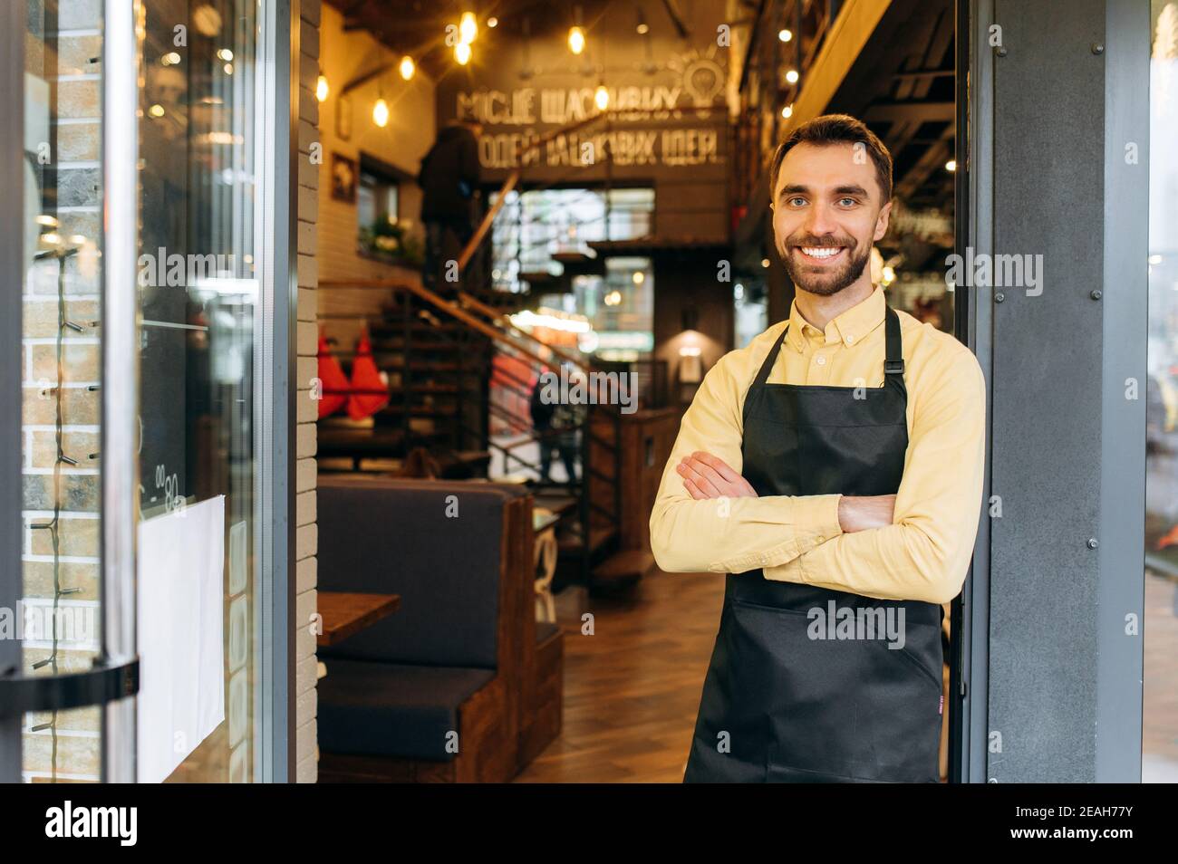 Bearded store employee wearing hi-res stock photography and images - Alamy