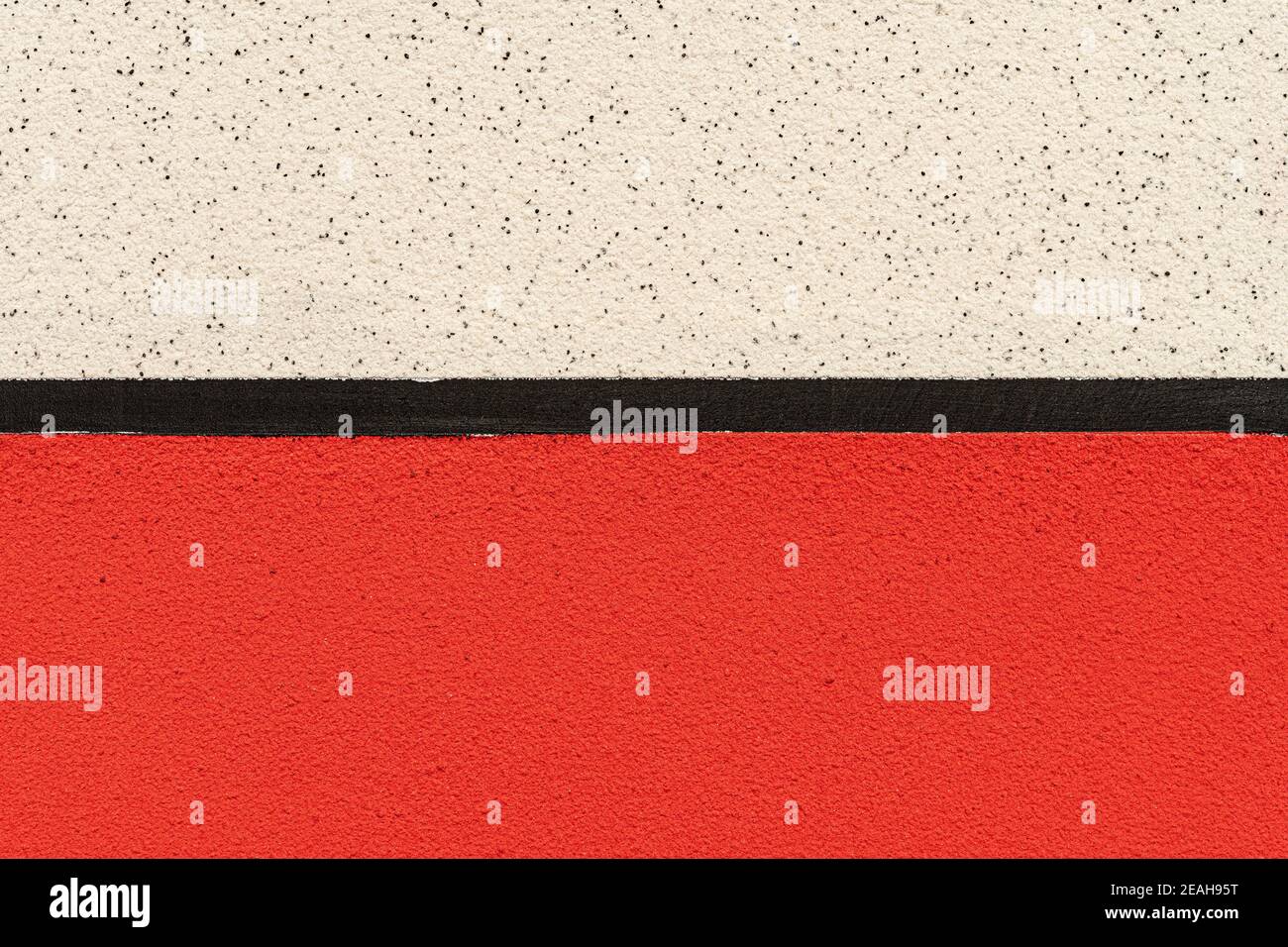 rough wall with half red and half white in a sunny day as texture and ...