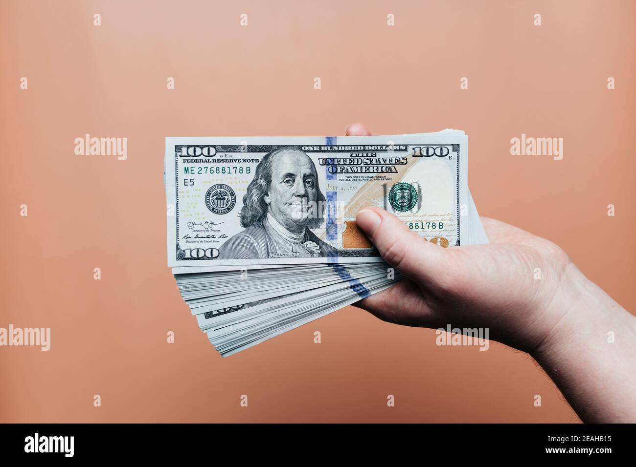 Hand dollars hi-res stock photography and images - Alamy