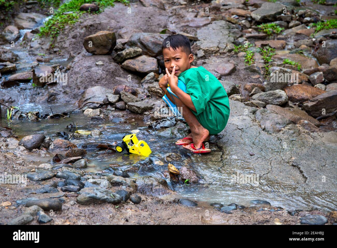 Dumaguete, the Philippines - 23 Dec 2020: little filipino boy plays ...