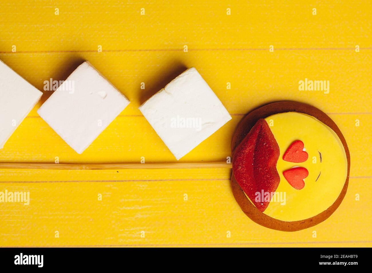 candy in the form of a smiley on a stick candy marmalade sweets yellow ...