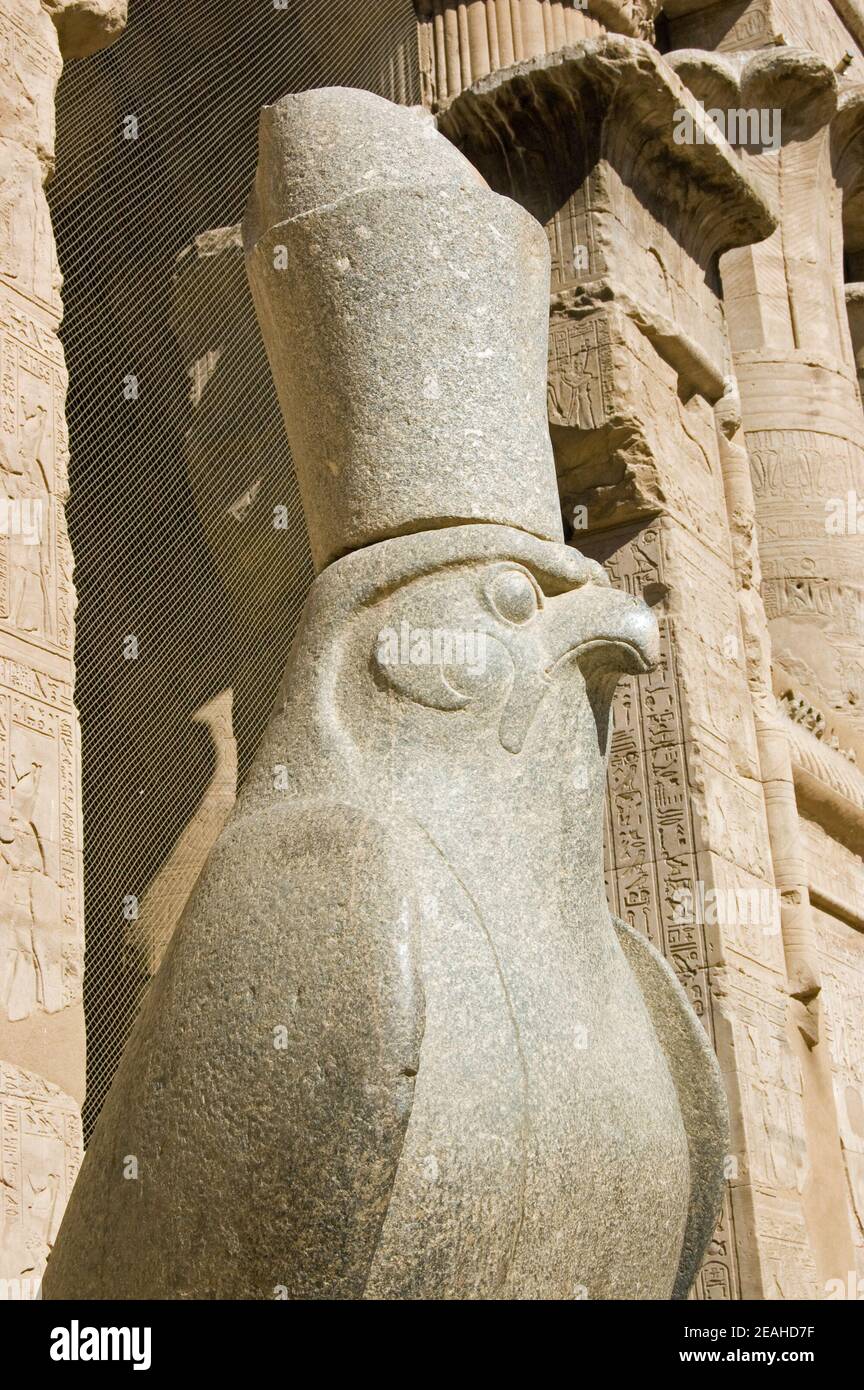 Ancient Egyptian statue of the hawk headed god Horus wearing the ...