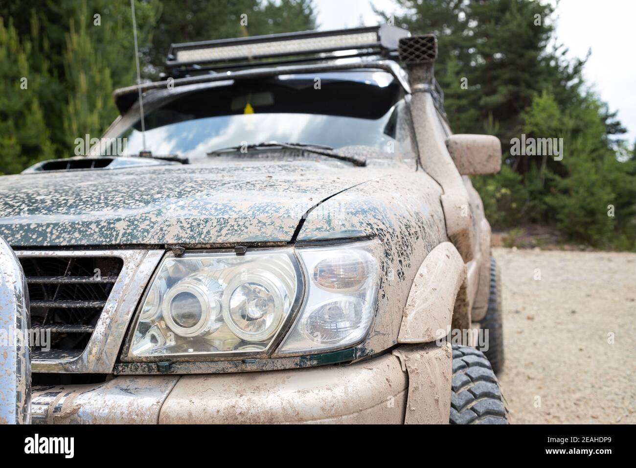 Close up picture of a dirty off road car Stock Photo - Alamy