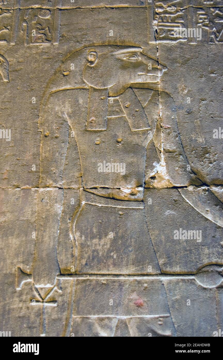 Ancient Egyptian hieroglyphic carving of the baboon headed god Baba ...