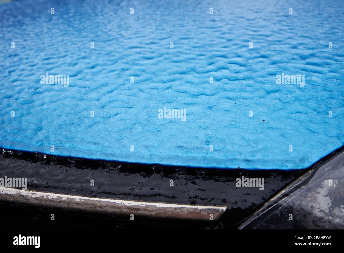 Car covered in freezing rain. Extreme winter weather for a driving ...