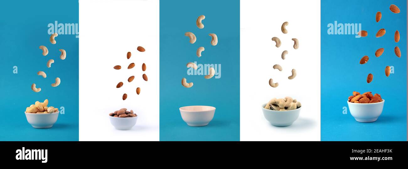 nuts pouring into a bowl against blue and white background. Flying food ...